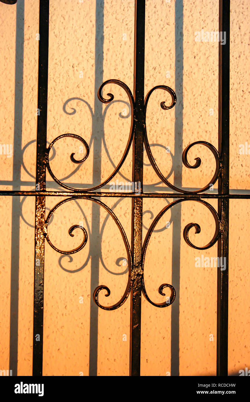 Security Bar Shadows cast on a wall from a window Stock Photo - Alamy