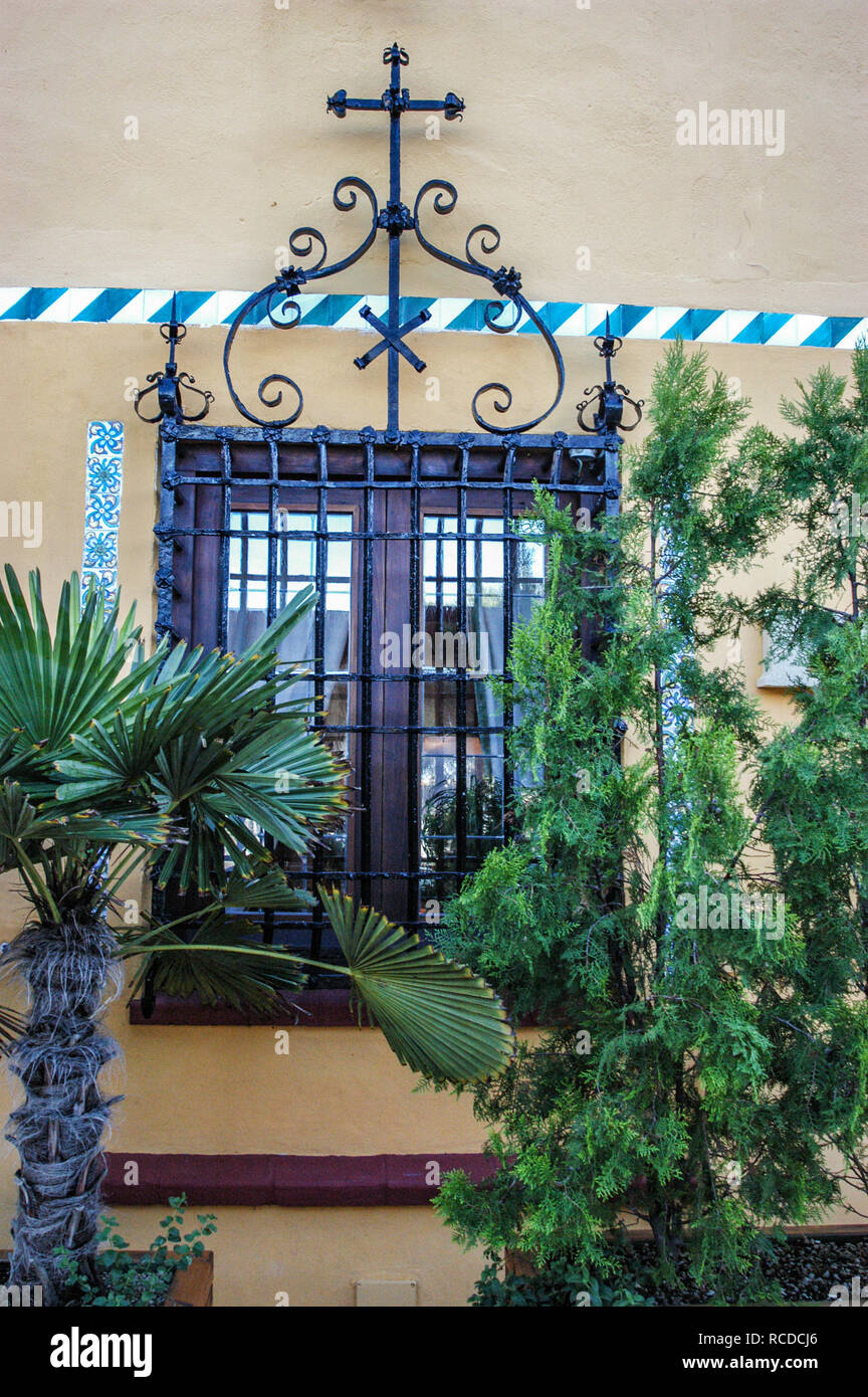 Security Bars protecting a house Window with wrought iron work detail ...