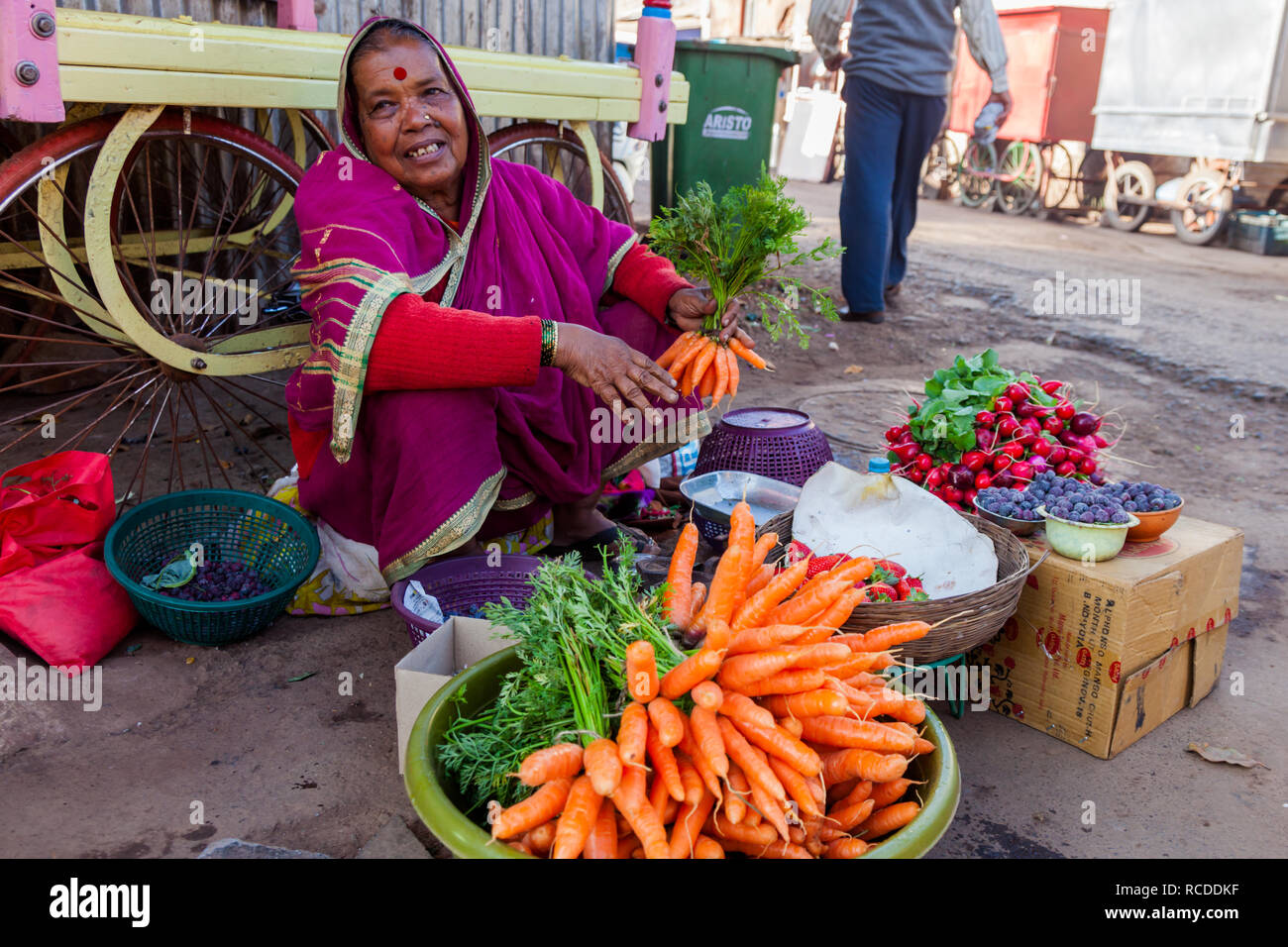 Carrot, Vegetable seller old lady by the roadside in Mahabaleshwar ...
