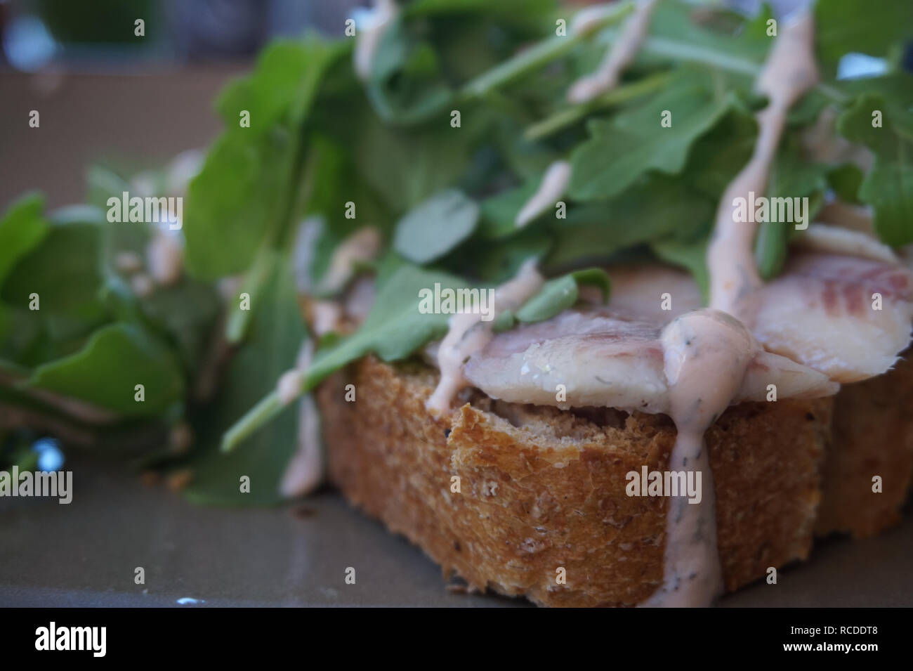 Open faced fish sandwich with Dutch paling (smoked eel). Topped with ...