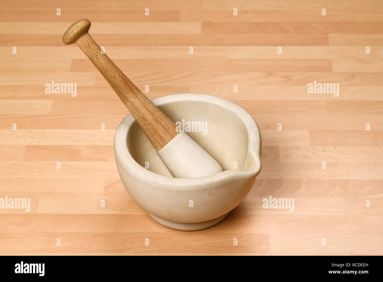 A pestle and mortar on a kitchen worktop Stock Photo - Alamy