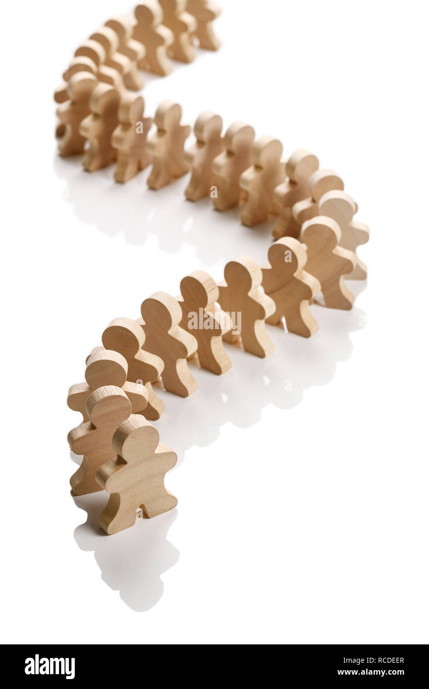 A line of small wooden people Stock Photo - Alamy