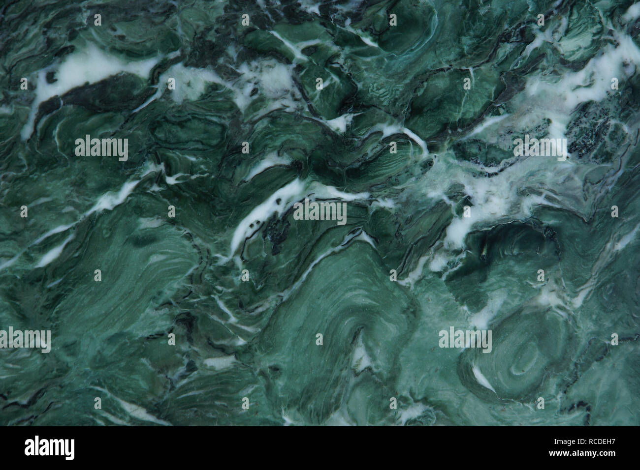 Beautiful background of natural stone marble green with white veins ...