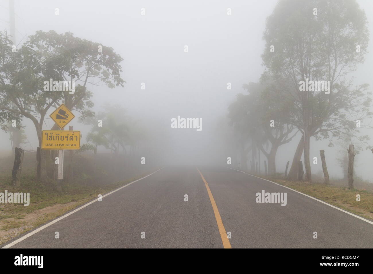 Fog Road Sign High Resolution Stock Photography and Images - Alamy