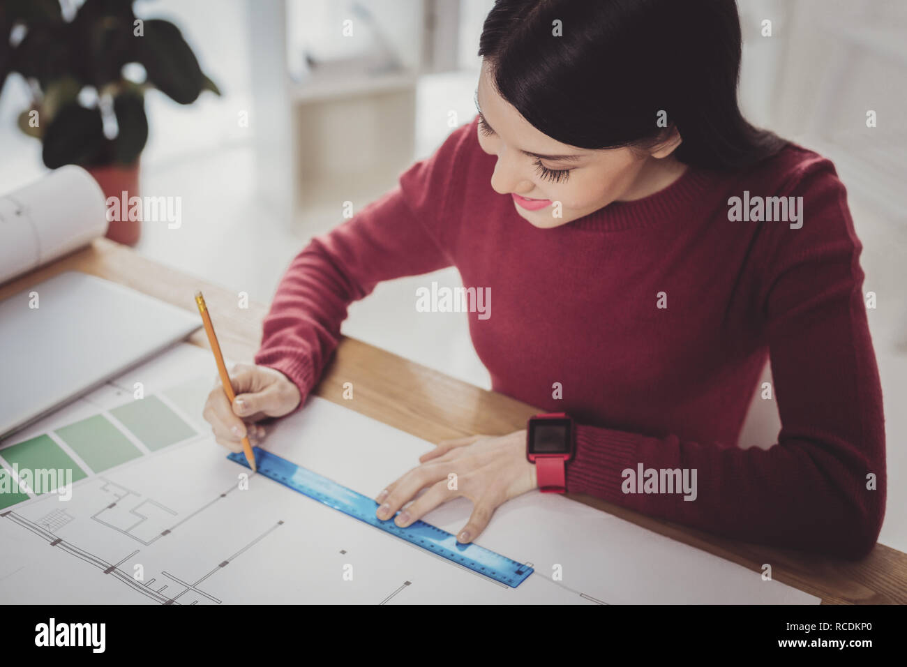 Smart professional architect doing a drawing Stock Photo - Alamy
