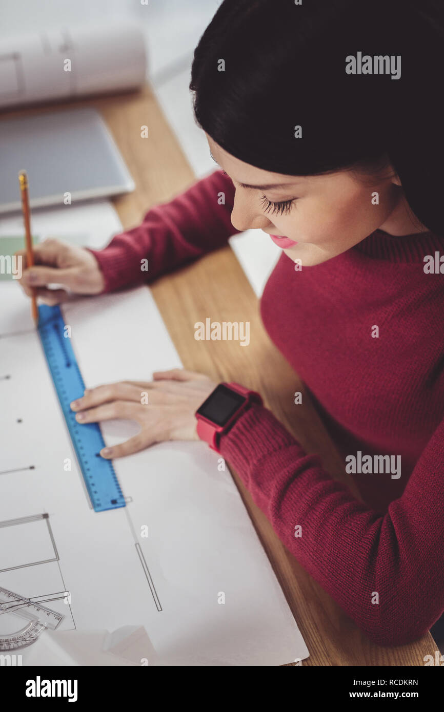 Smart female engineer focusing on work Stock Photo - Alamy
