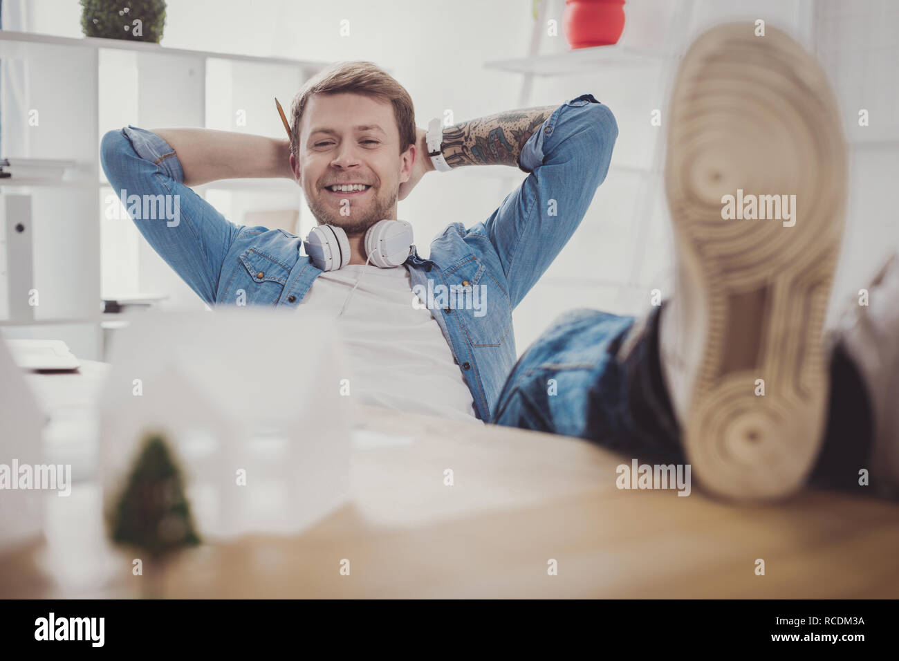 Cheerful happy man finishing the project Stock Photo - Alamy