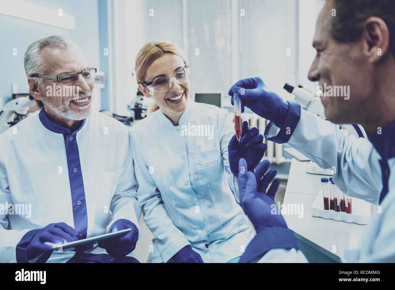 Close up chemical scientists working hi-res stock photography and ...