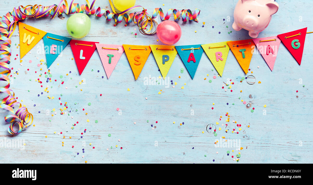 Festive flag bunting with WeltSparTag text, or world savings day, with ...