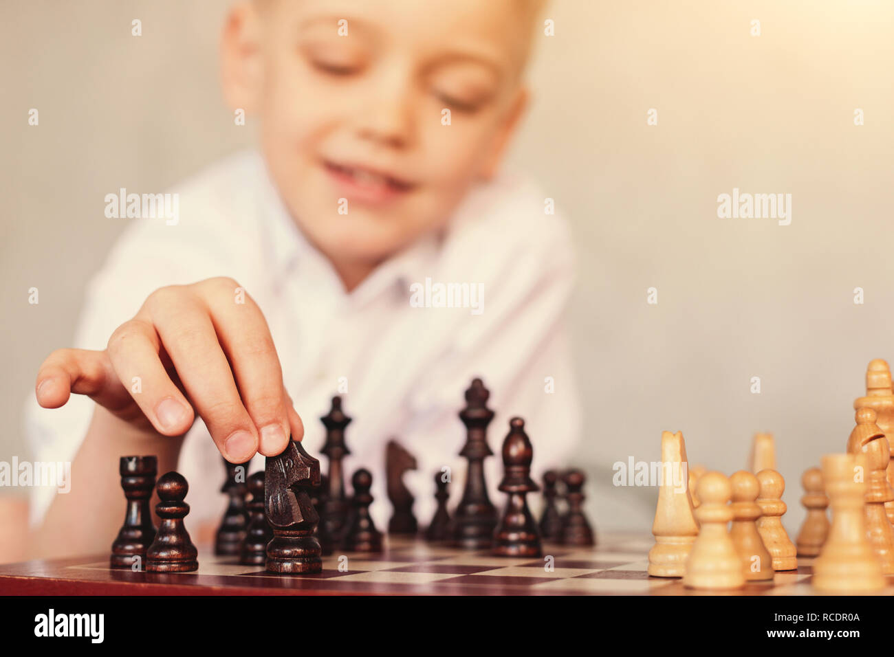Little prodigy. The focus being on the hand of a cheerful little boy ...