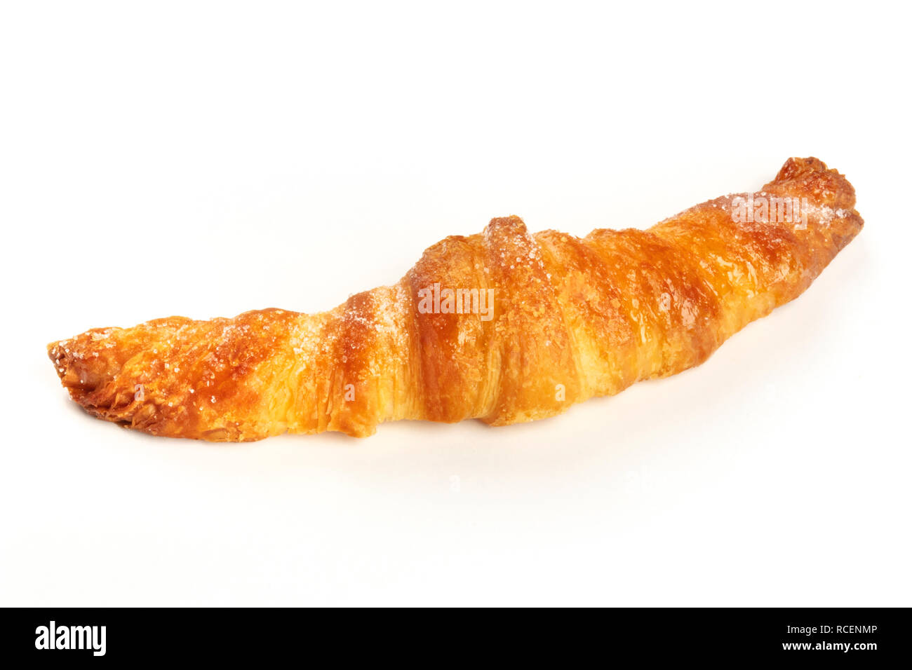 A photo of a croissant on a white background with a place for text ...