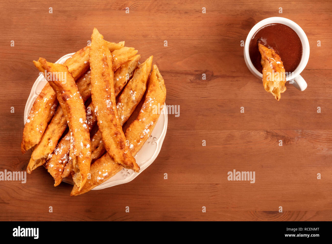 Spanish porras with hot chocolate, a typical Madrid Sunday breakfast ...