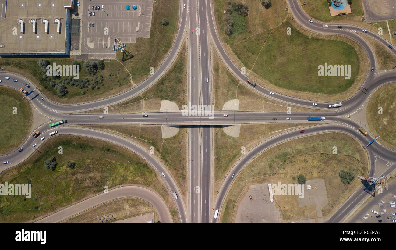 Aerial view of transport junction, traffic cross road junction day view ...
