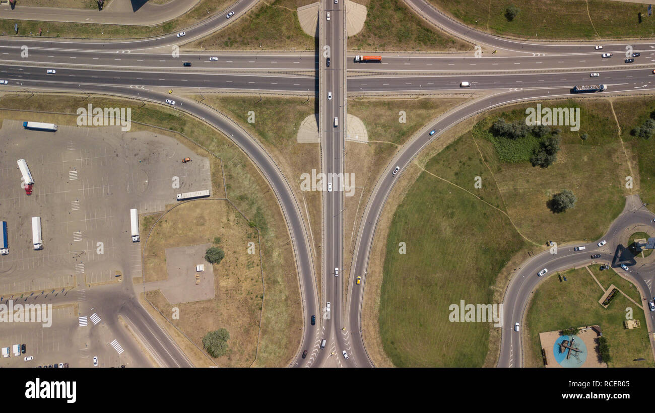 Aerial view of transport junction, traffic cross road junction day view ...