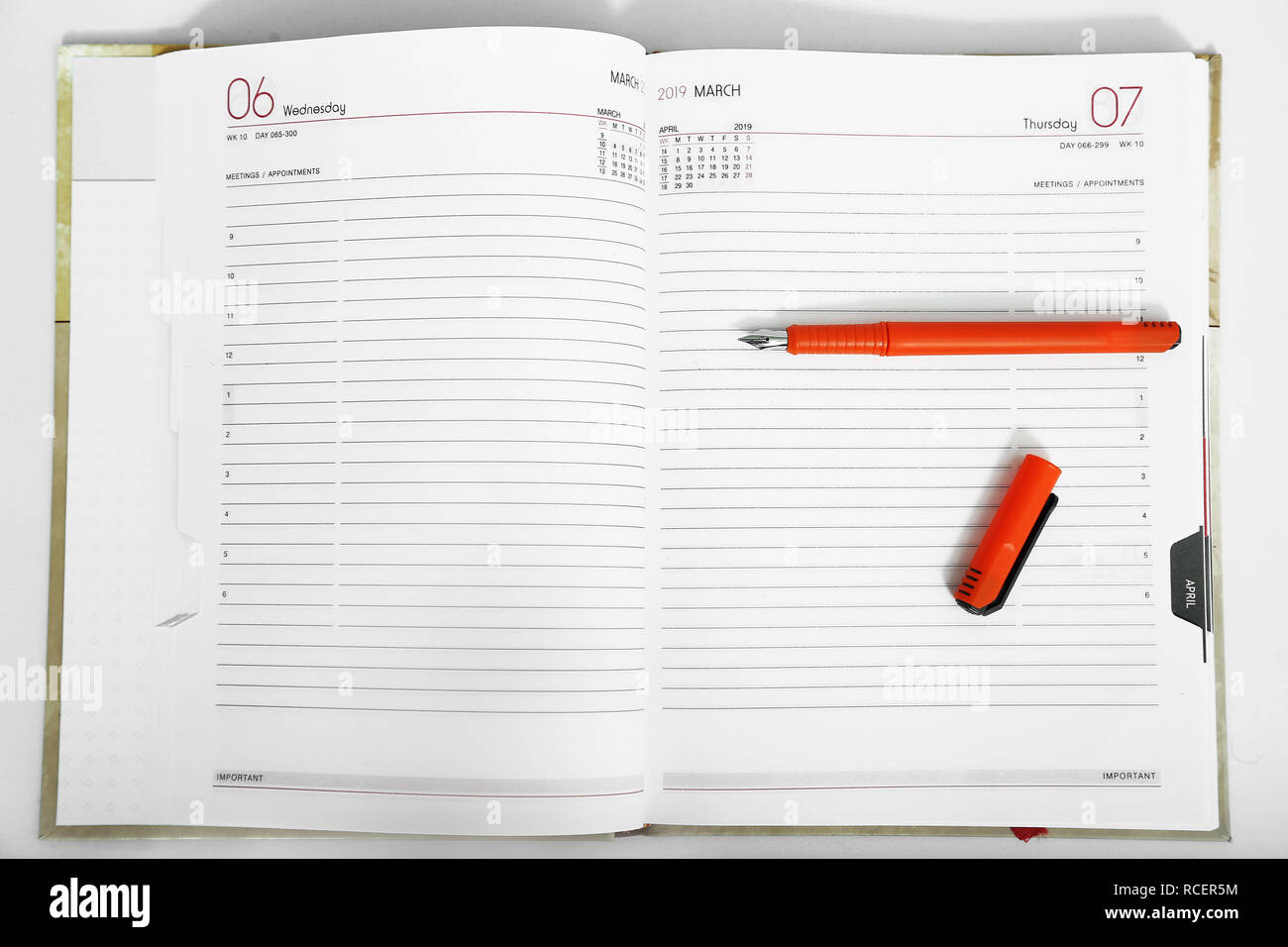Picture of diary with pen. Isolated on the white background Stock Photo ...