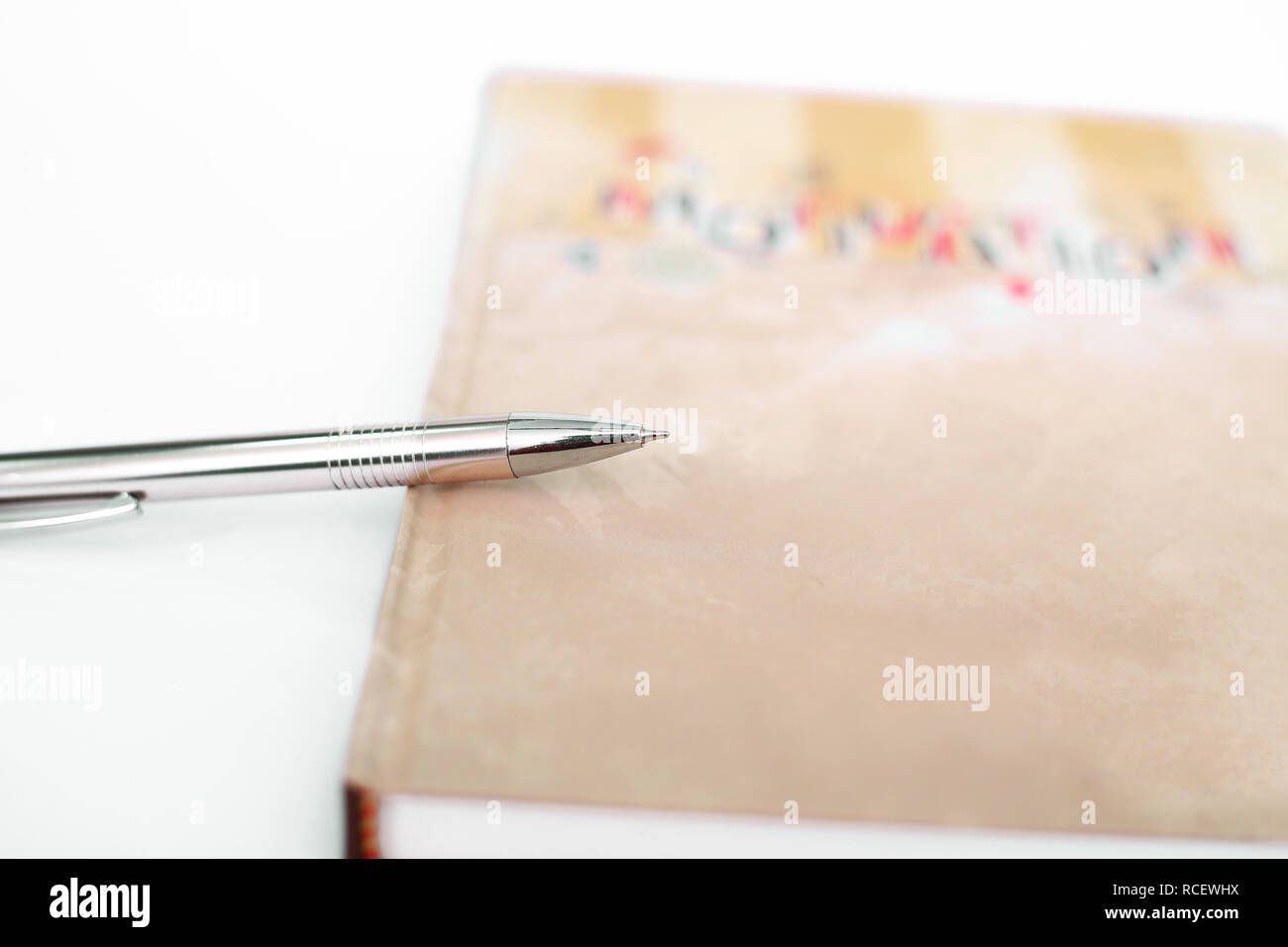 Picture of diary with pen. Isolated on the white background Stock Photo ...