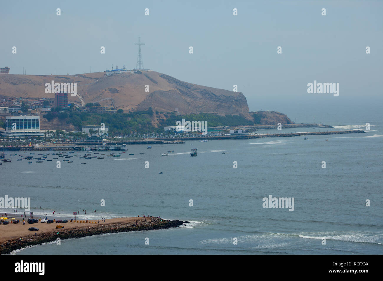 Great cross at the edge of the cliff in Lima Stock Photo - Alamy