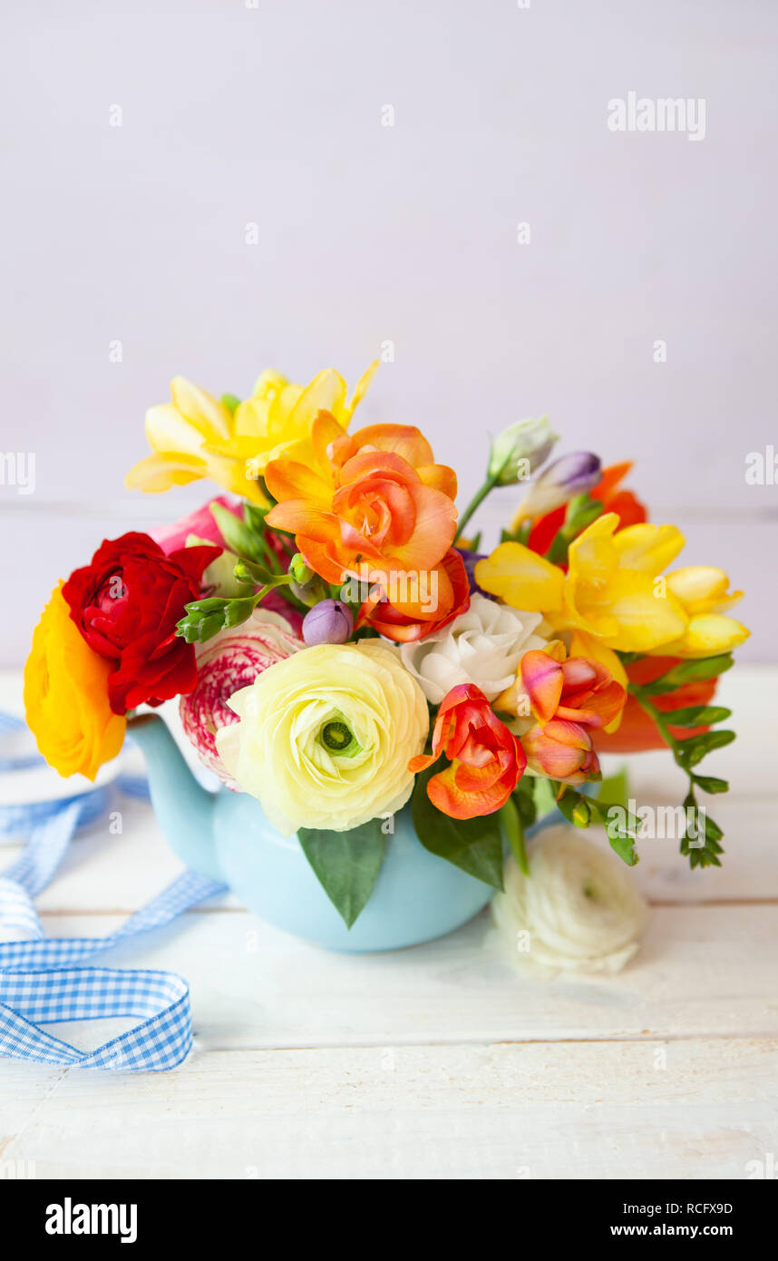 Little bouquet made from bright cheerful spring flowers Stock Photo - Alamy