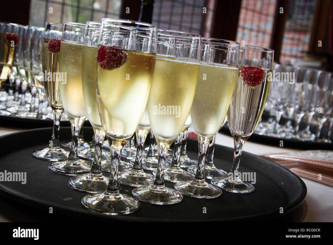 Champagne flutes tray hi-res stock photography and images - Alamy