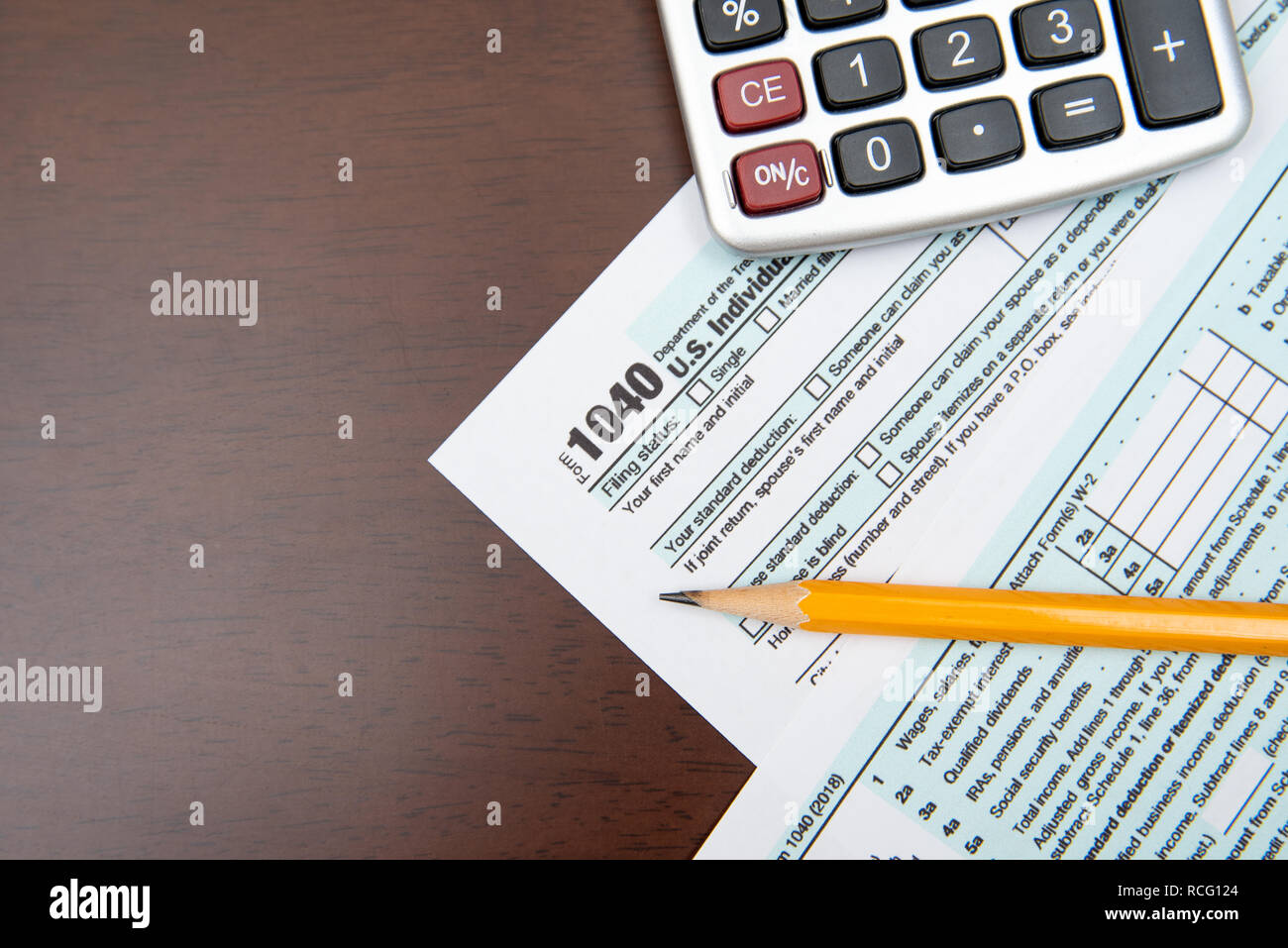 Pen on US TAX form Background. Tax Day concept Stock Photo - Alamy