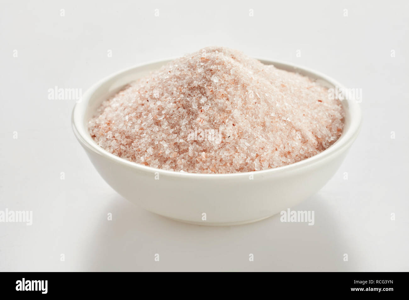 Bowl of pink Pakistani rock salt from the Indus Valley viewed high ...