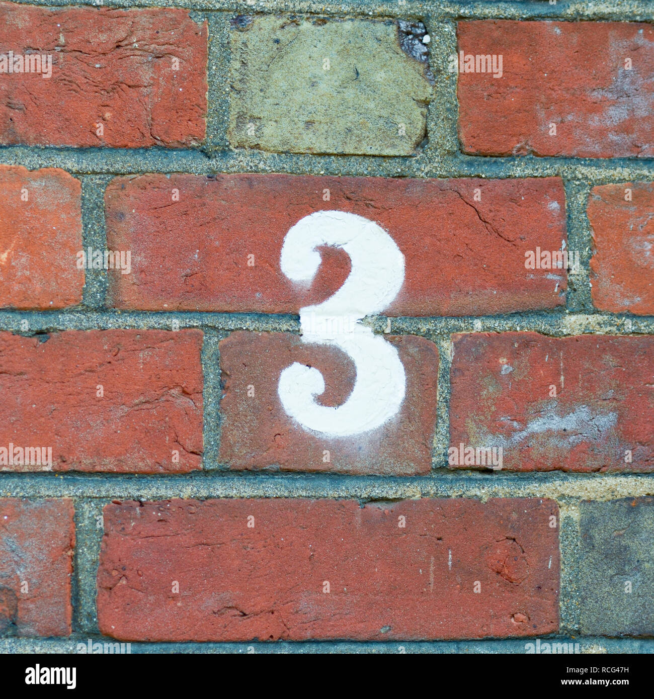 House number 3 sign painted on wall Stock Photo - Alamy