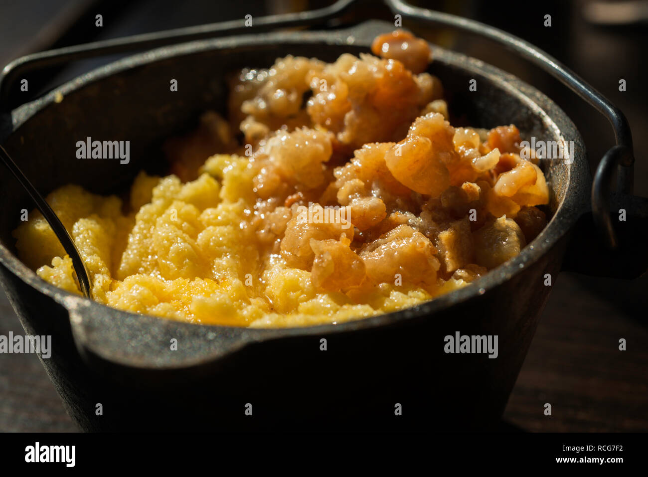 a Banush, a typical Ukrainian local food in the Carpathian Mountains ...