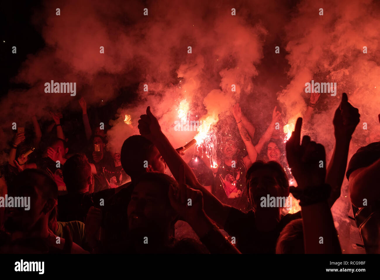 Thessaloniki, Greece - September 22, 2018: Music fans burn fire torch ...