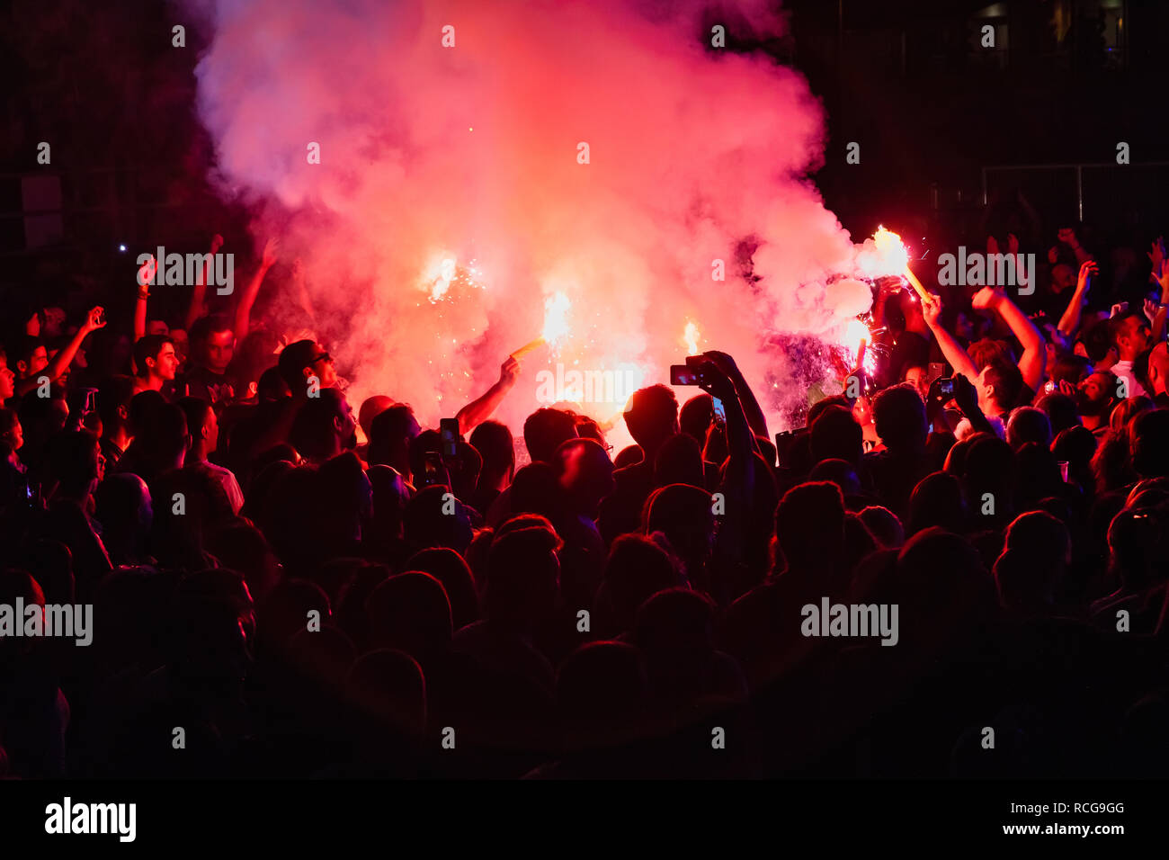 Thessaloniki, Greece - September 22, 2018: Music fans burn fire torch ...