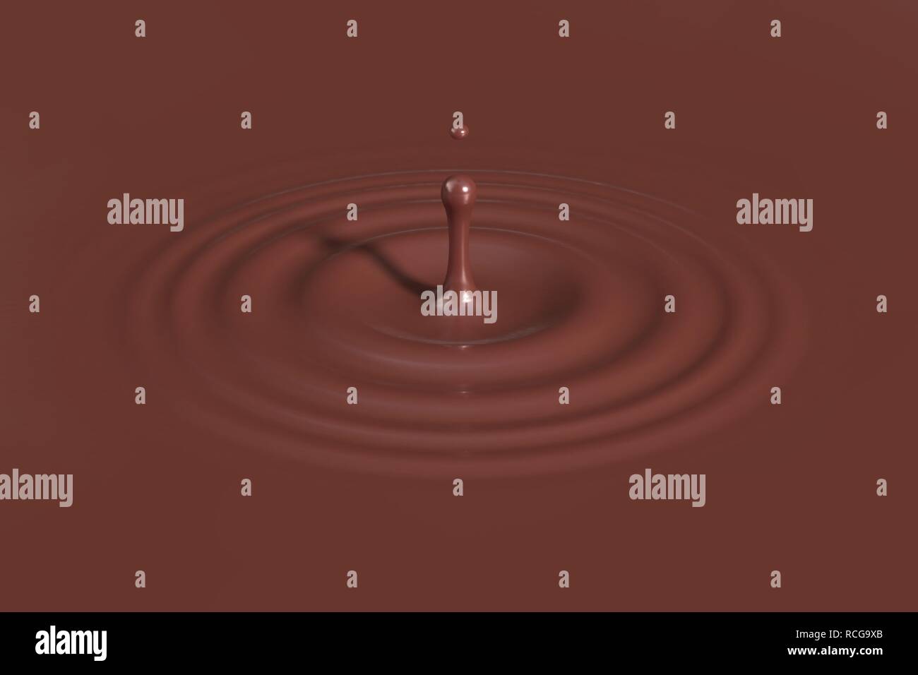 Drop of coffee or melted chocolate falling down and creating round ...