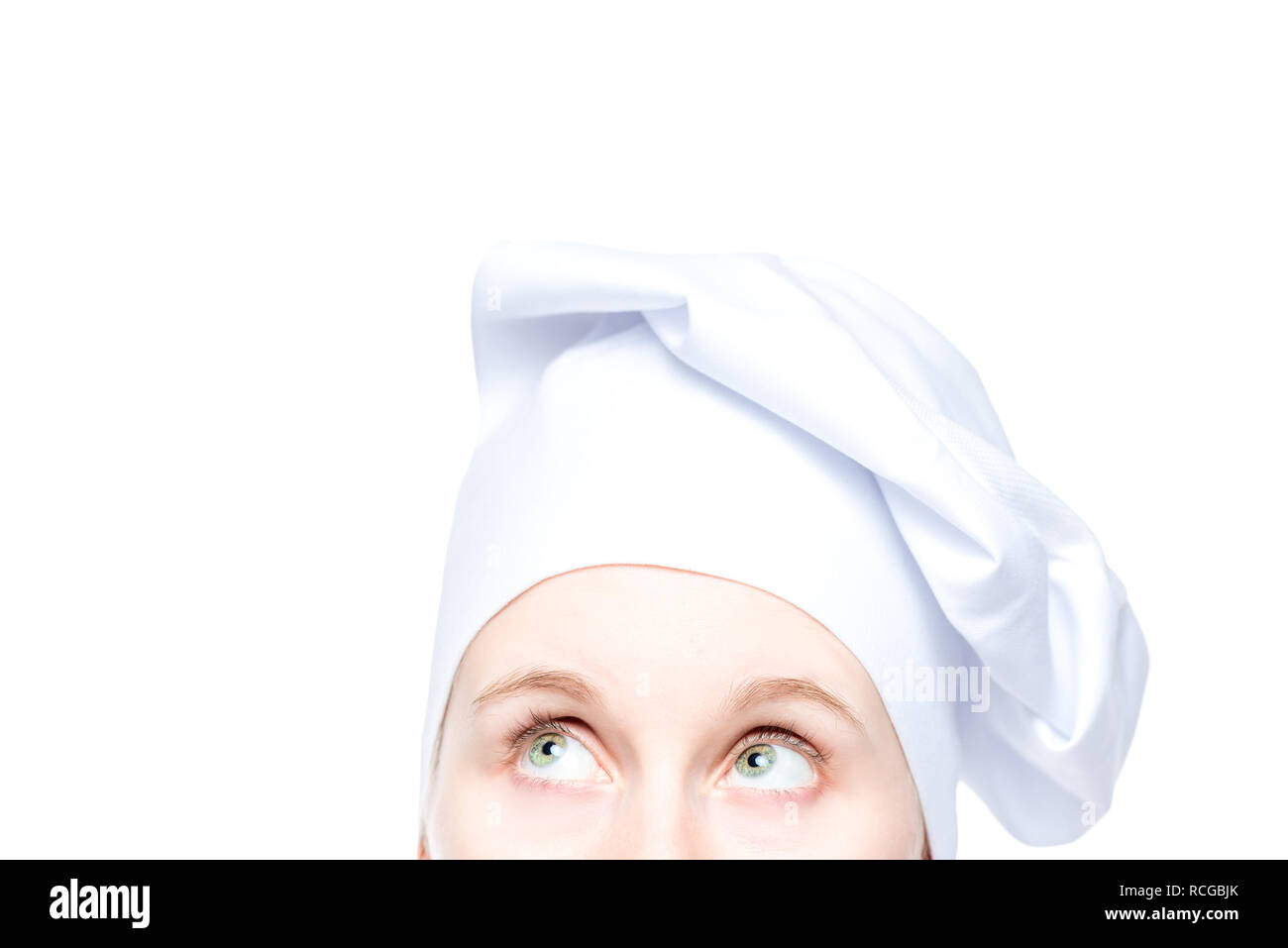 eyes of cook in hat close up on white background Stock Photo - Alamy