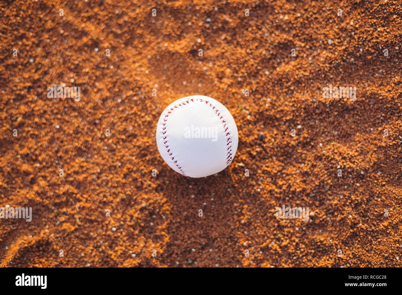 Baseball ball on pitchers mound Stock Photo - Alamy