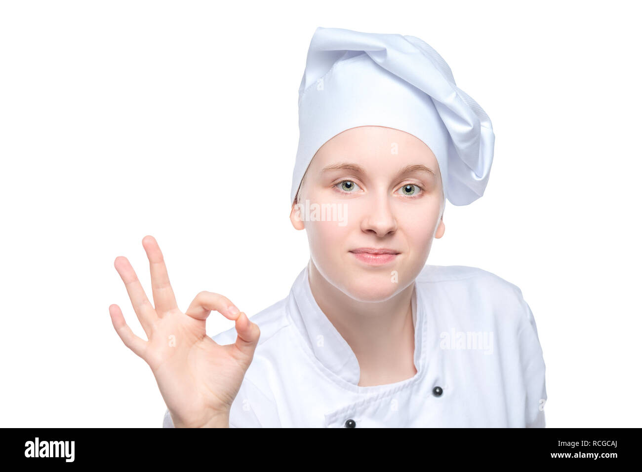 portrait of a young experienced chef with hand gesture on white ...