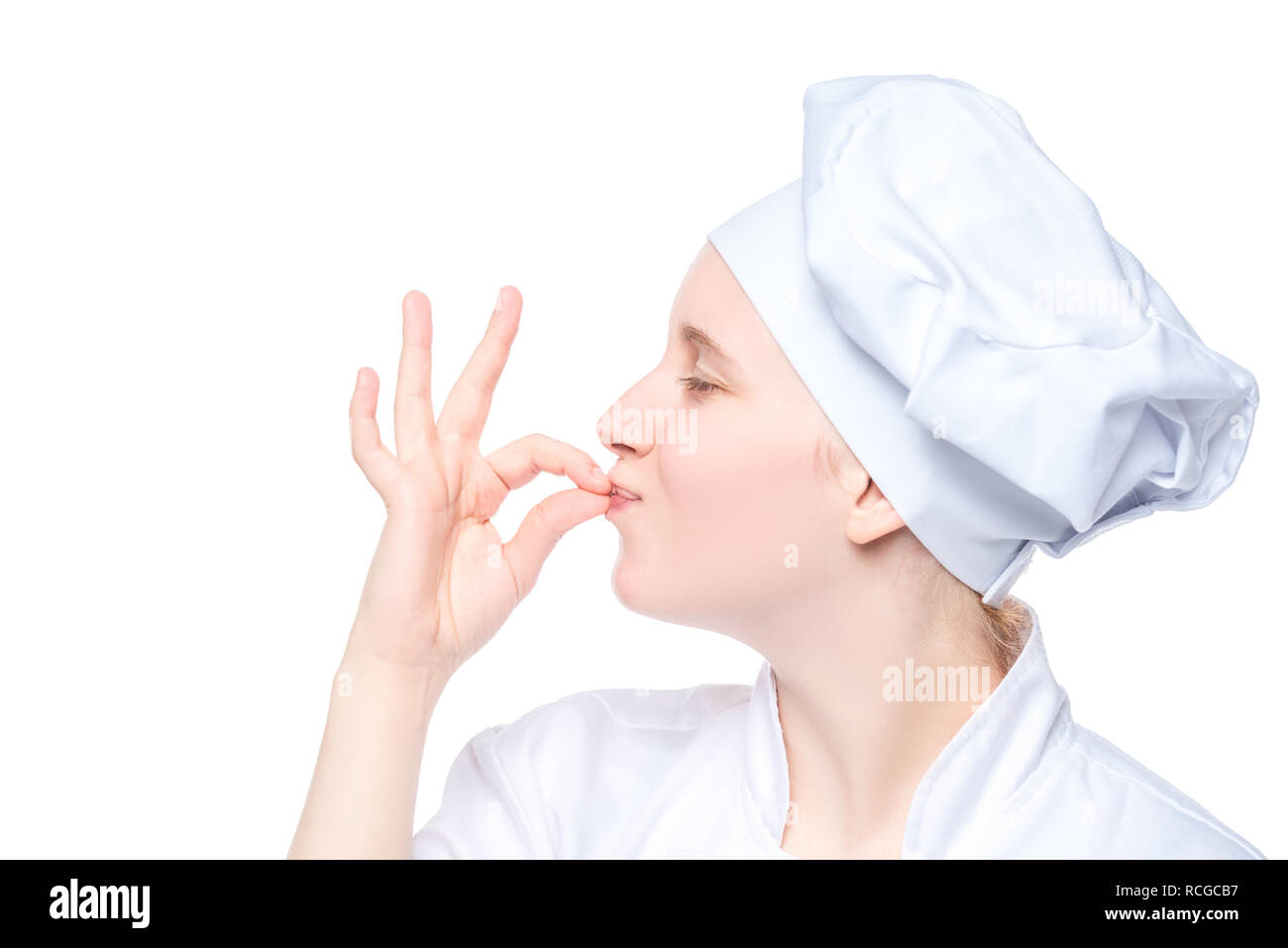 chef shows gesture all tasty on white background Stock Photo - Alamy