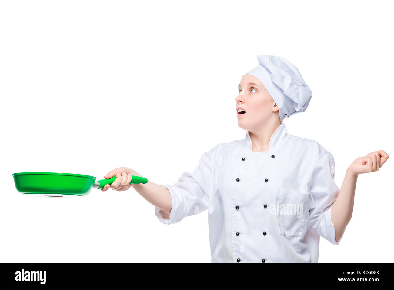 cook throws up food in a frying pan, emotional portrait on a white ...