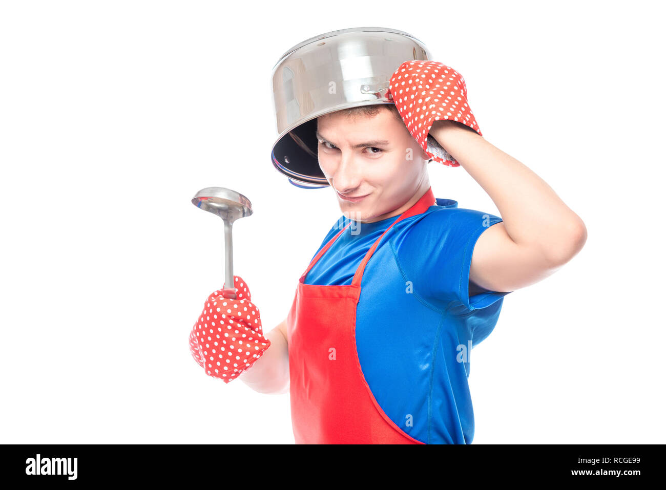 crazy man in an apron with a pan on his head posing on a white ...