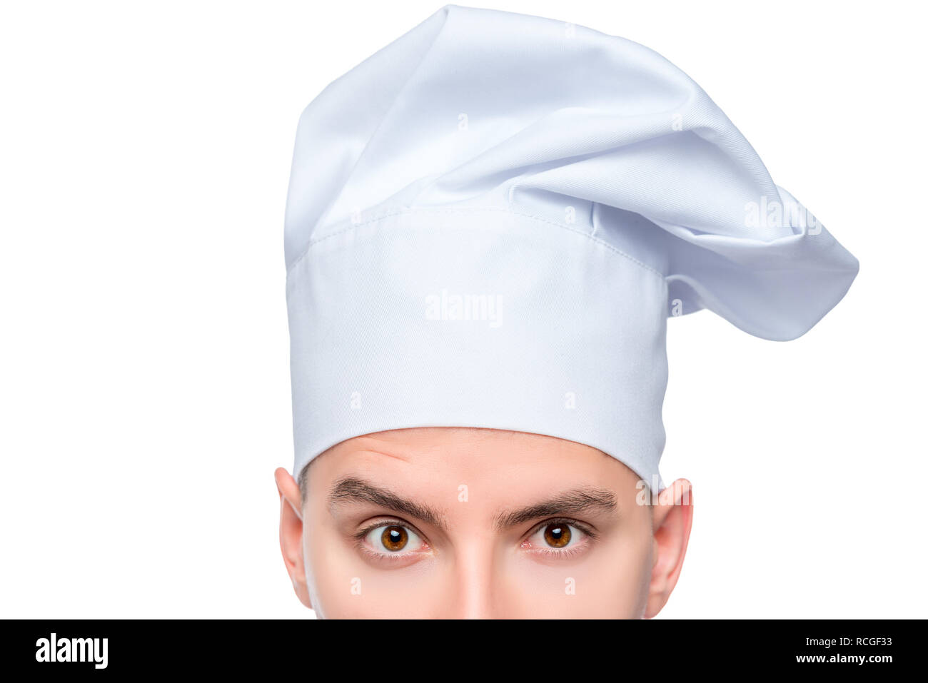 look cook in a cap, eyes close up, portrait isolated on white ...