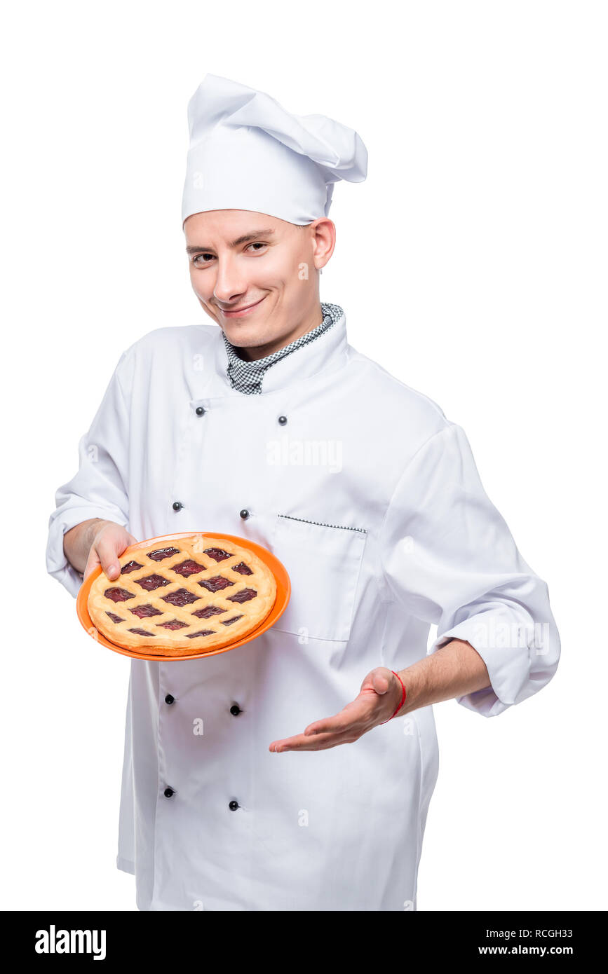vertical portrait of a cook with homemade pie, portrait isolated on a ...