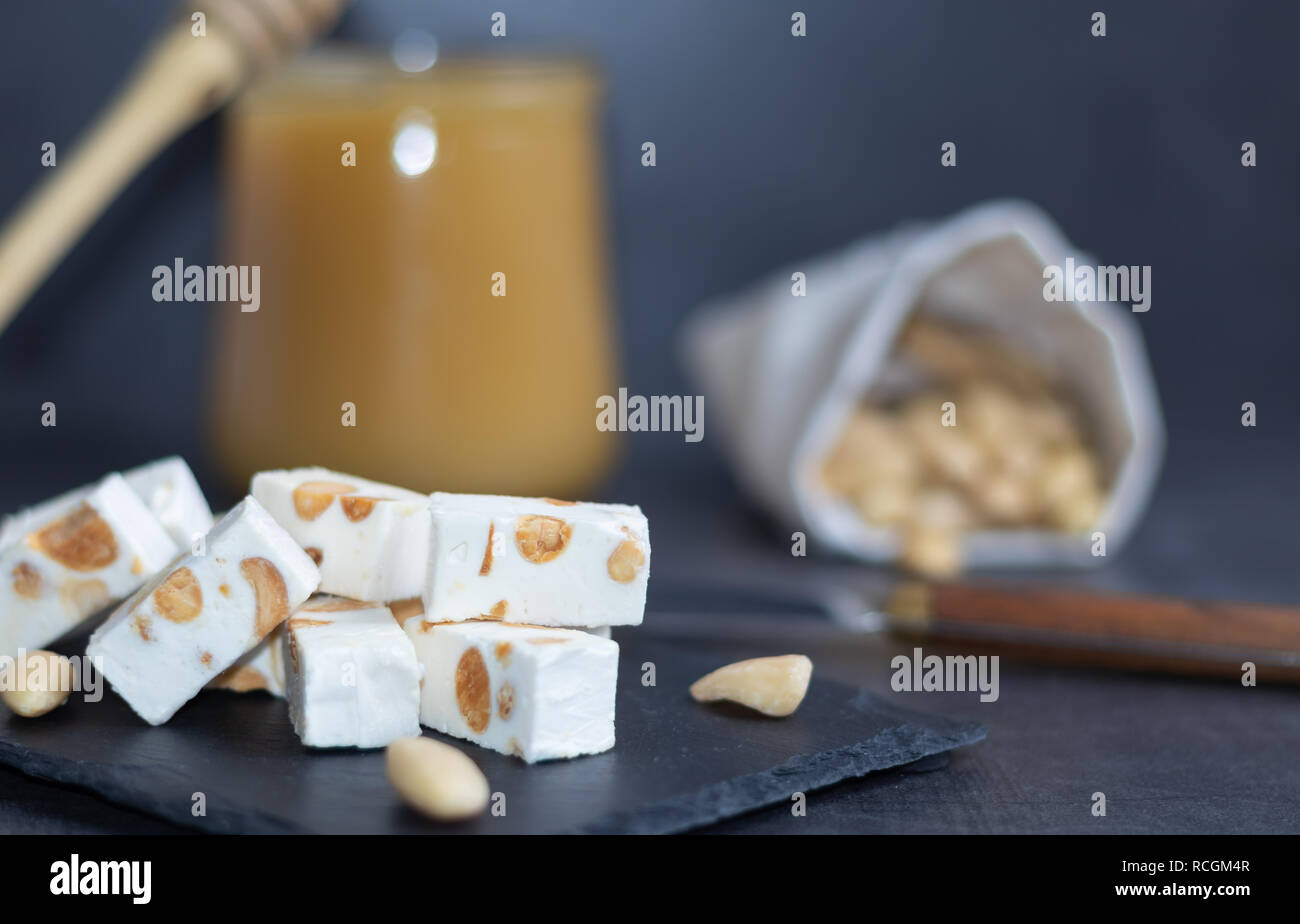 Homemade nougat with honey and almonds Stock Photo - Alamy
