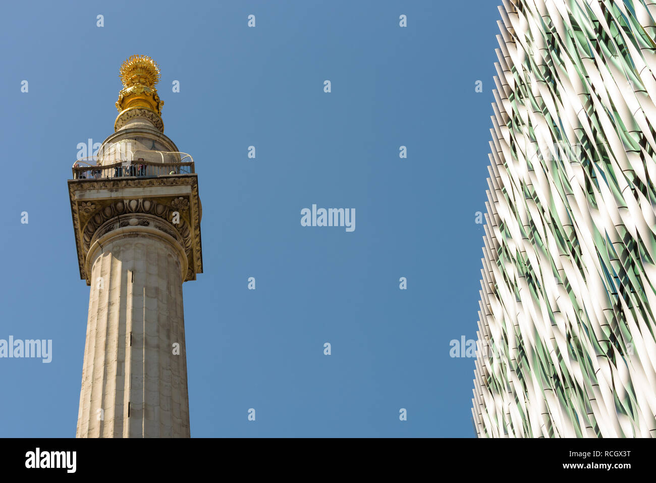 The tall column of the Monument to the Great Fire of London in 1666 on ...