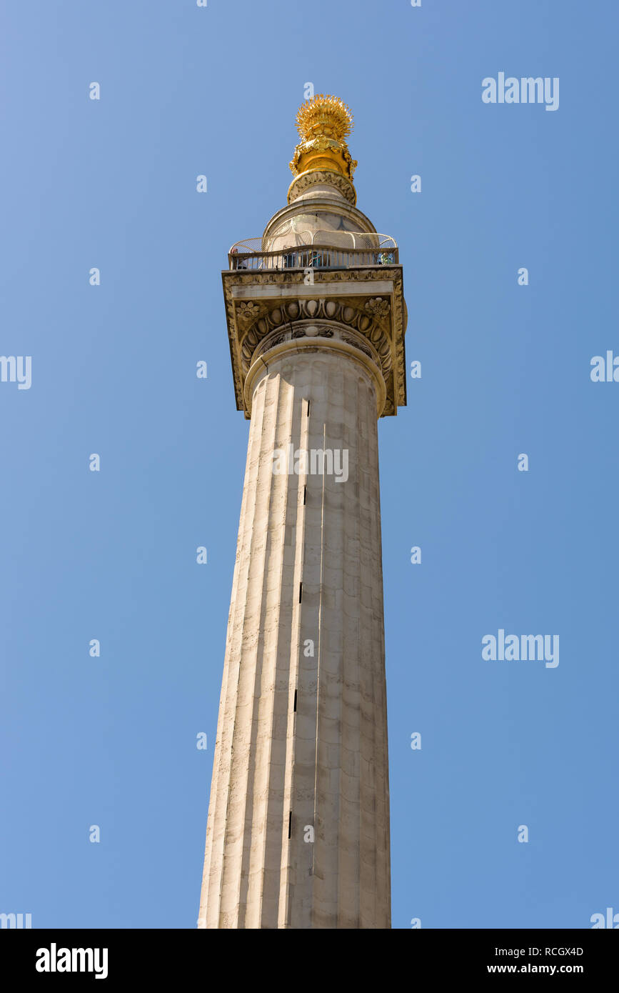 The tall column of the Monument to the Great Fire of London in 1666 on ...