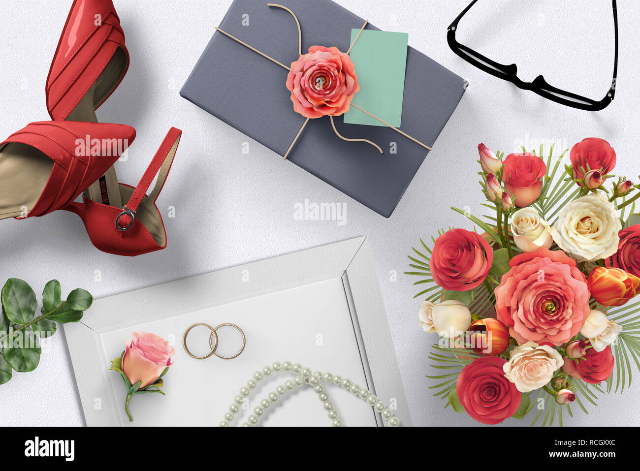 Frame with two wedding rings on white background Stock Photo - Alamy