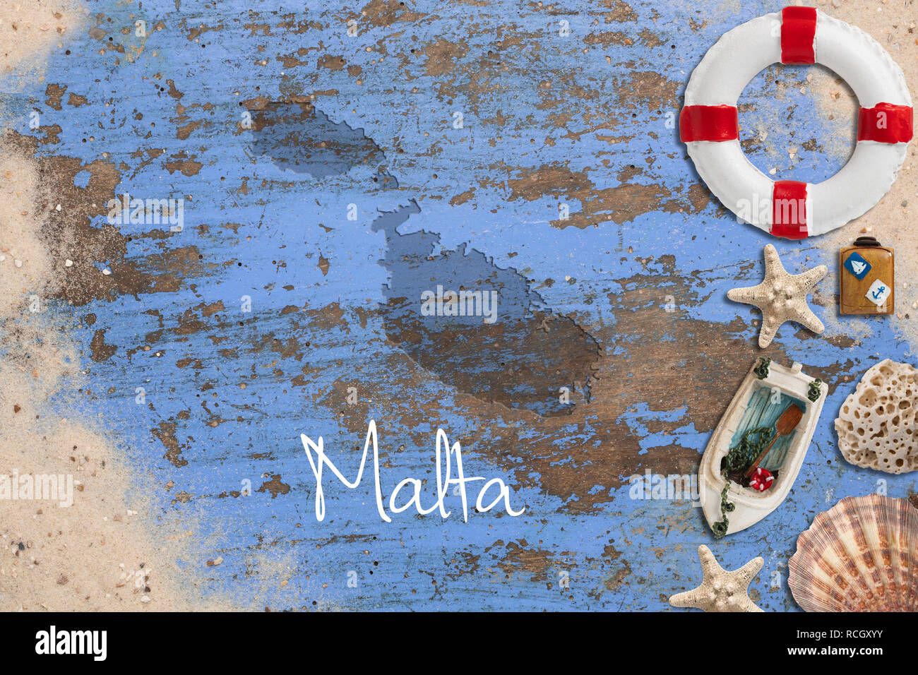 Maritime decoration and the shape of the island "Malta" on blue wooden ...