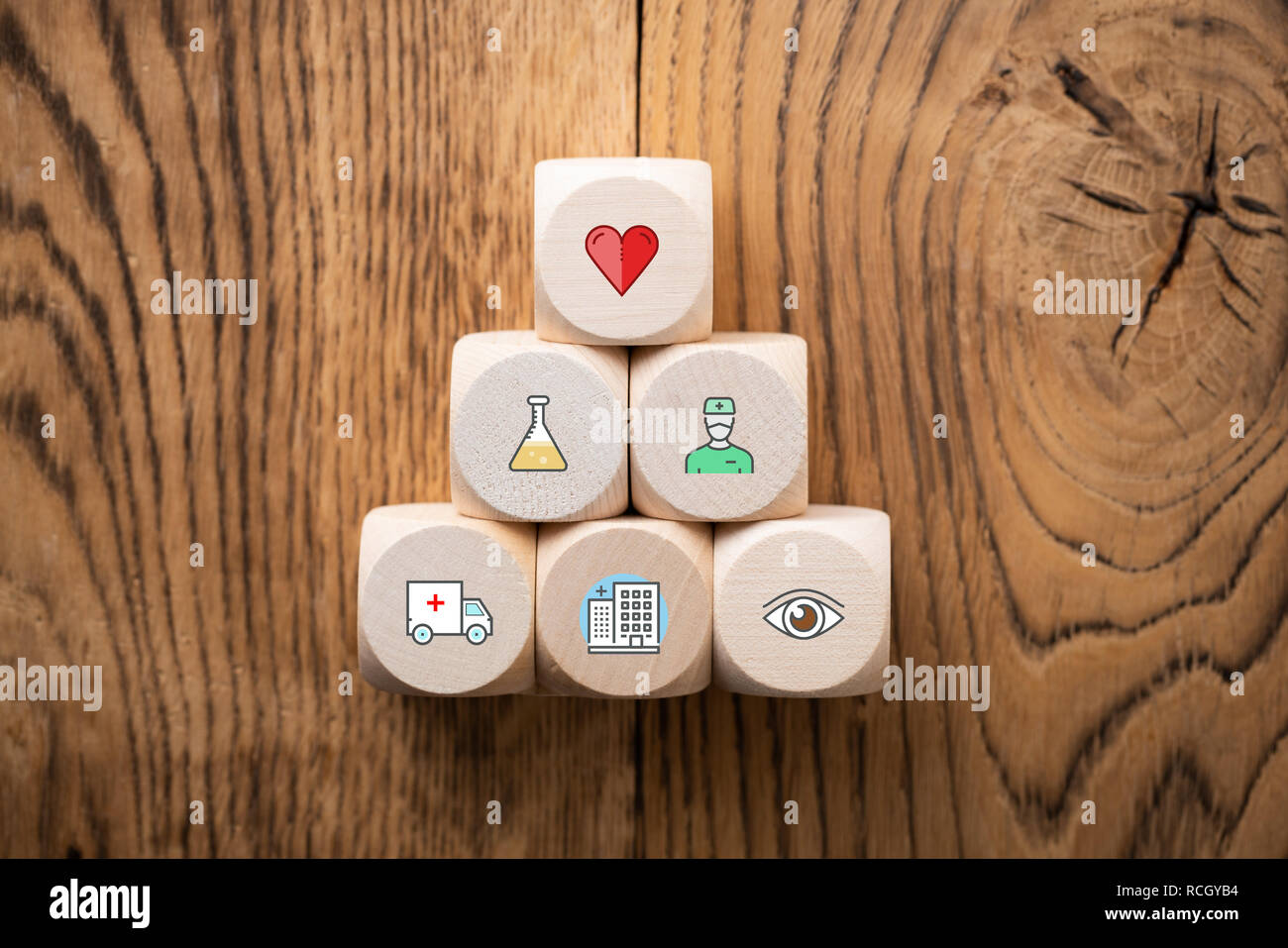 medical icons on cubes on wooden background Stock Photo - Alamy