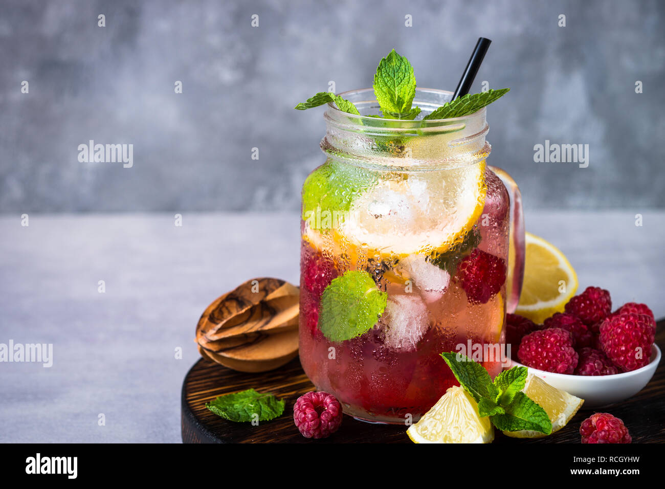Raspberry lemonade in mason jar Stock Photo - Alamy