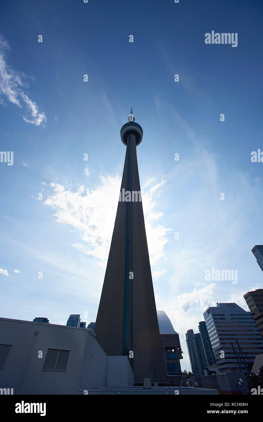 Low angle shot of the amazing CN Tower in the city centre of Toronto ...