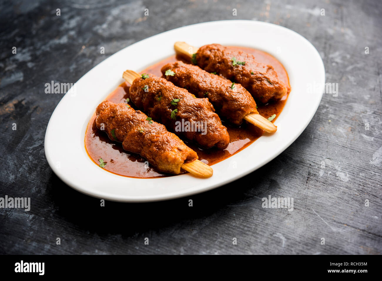Soya Chaap Curry served in a bowl. Healthy recipe popular in India and ...