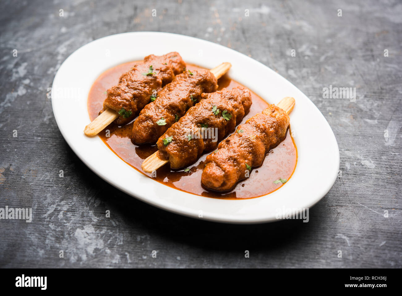 Soya Chaap Curry served in a bowl. Healthy recipe popular in India and ...