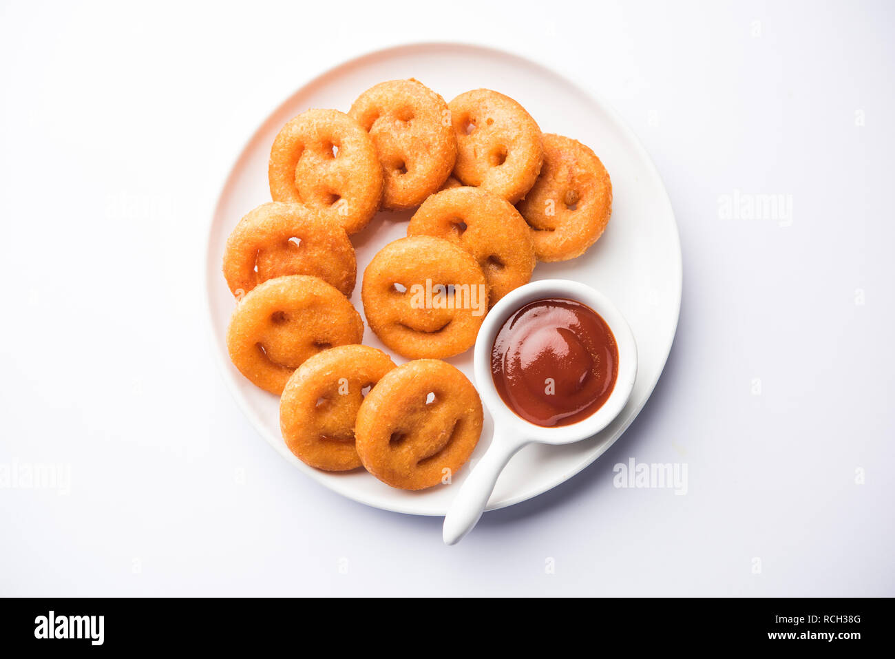 Crunchy potato smiling face snacks hi-res stock photography and images ...