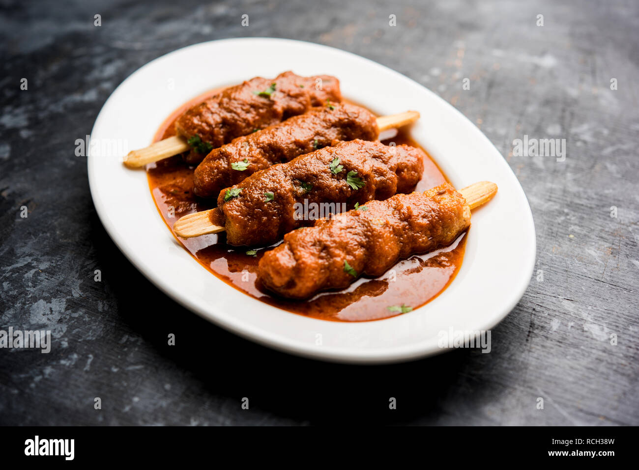 Soya Chaap Curry served in a bowl. Healthy recipe popular in India and ...